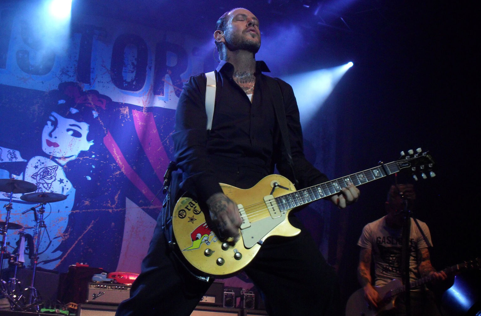 Mike Ness, frontman of Social Distortion, during a 2012 concert in ...